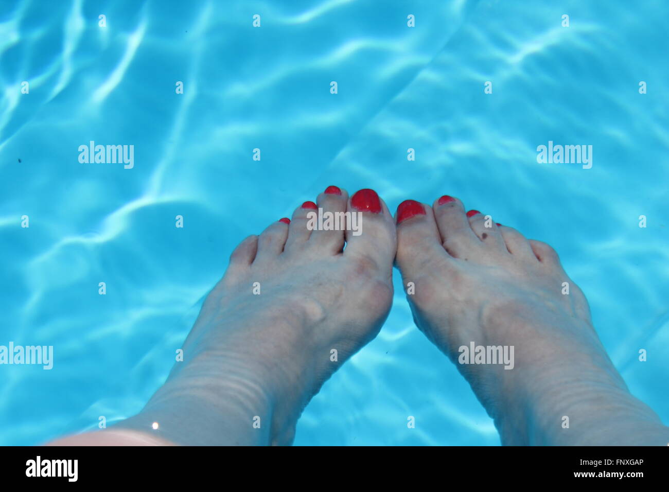 pool feet swimming poolside aqua blue water background copy space Stock ...