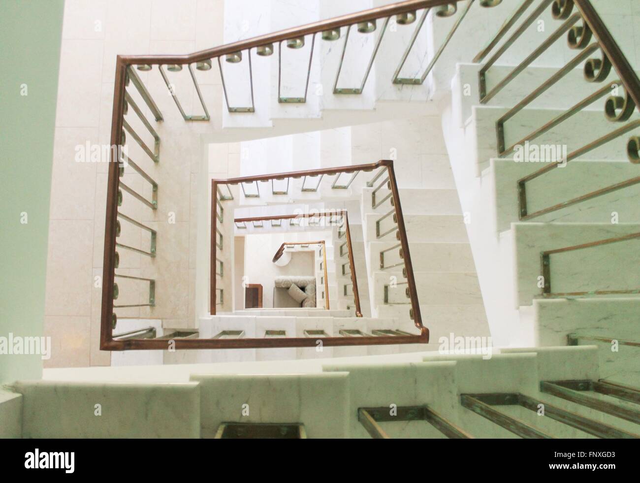 Spiral square stairs viewed from above Stock Photo - Alamy