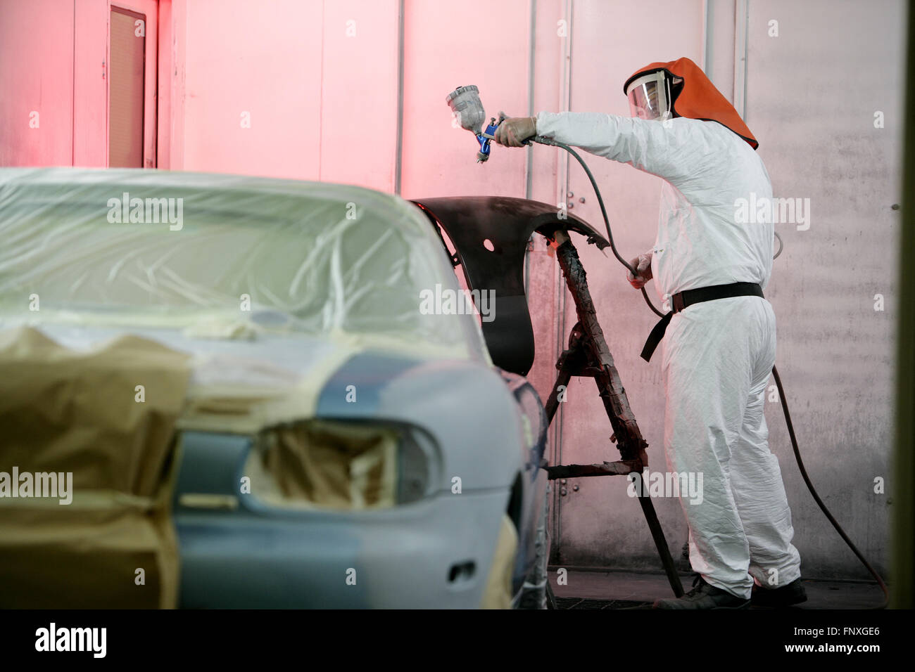 automotive repairs in the bodyshop. A car has its bodywork repaired and ...