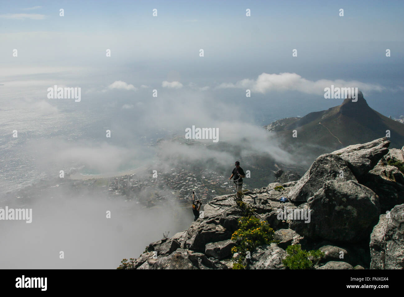 climbers prepare their ropes at the top of Table Mountain, Cape Town ...
