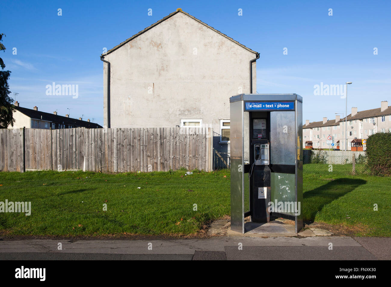 A community, public telephone box on a housing estate Stock Photo - Alamy