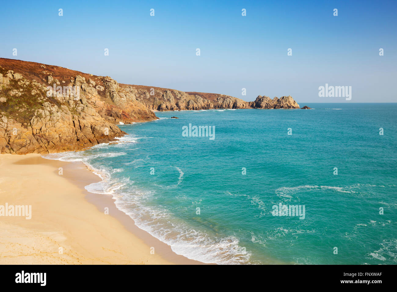 A beautiful beach with turquoise water at Porthcurno in Cornwall ...