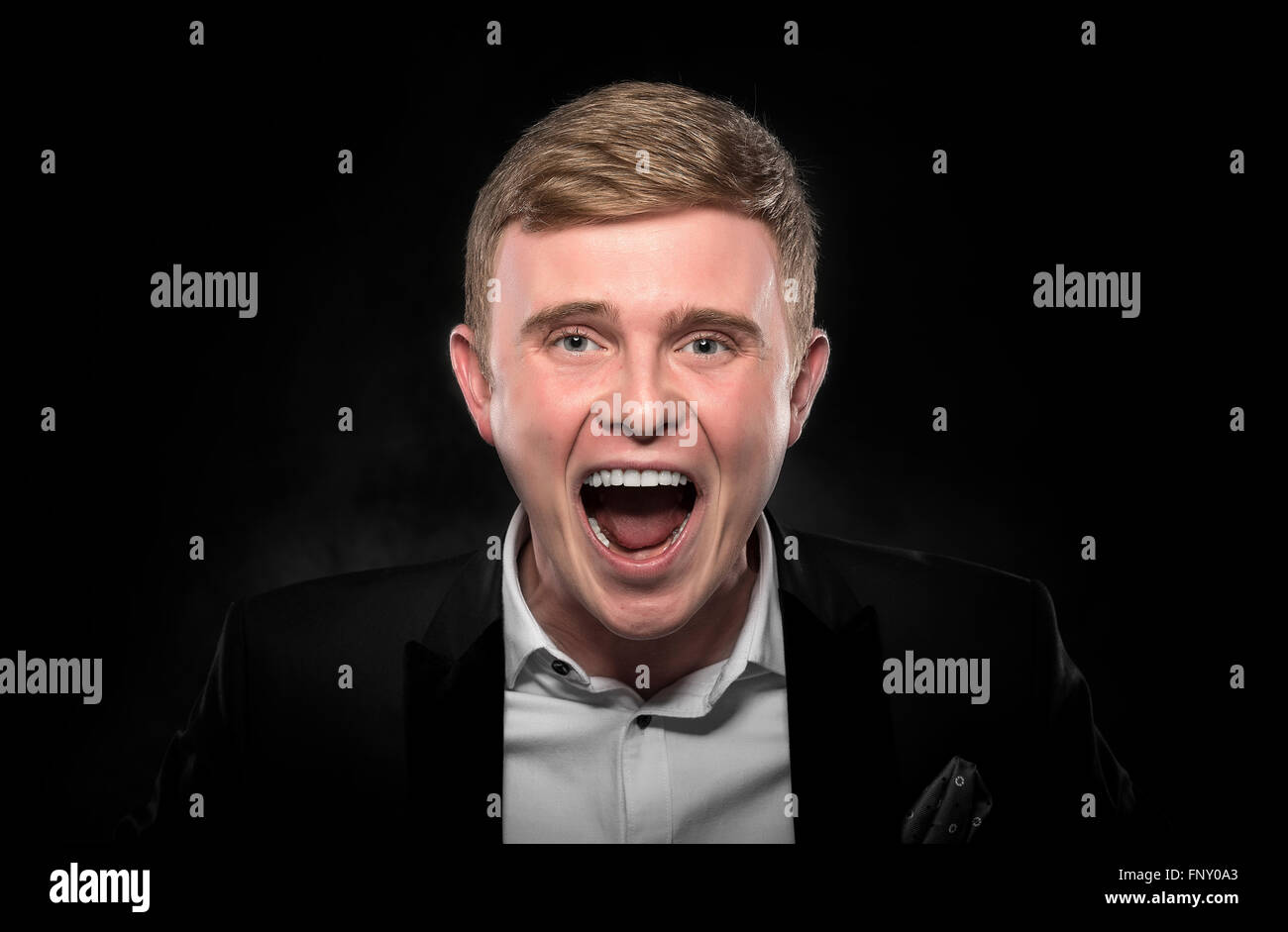 Angry businessman shouting Stock Photo - Alamy