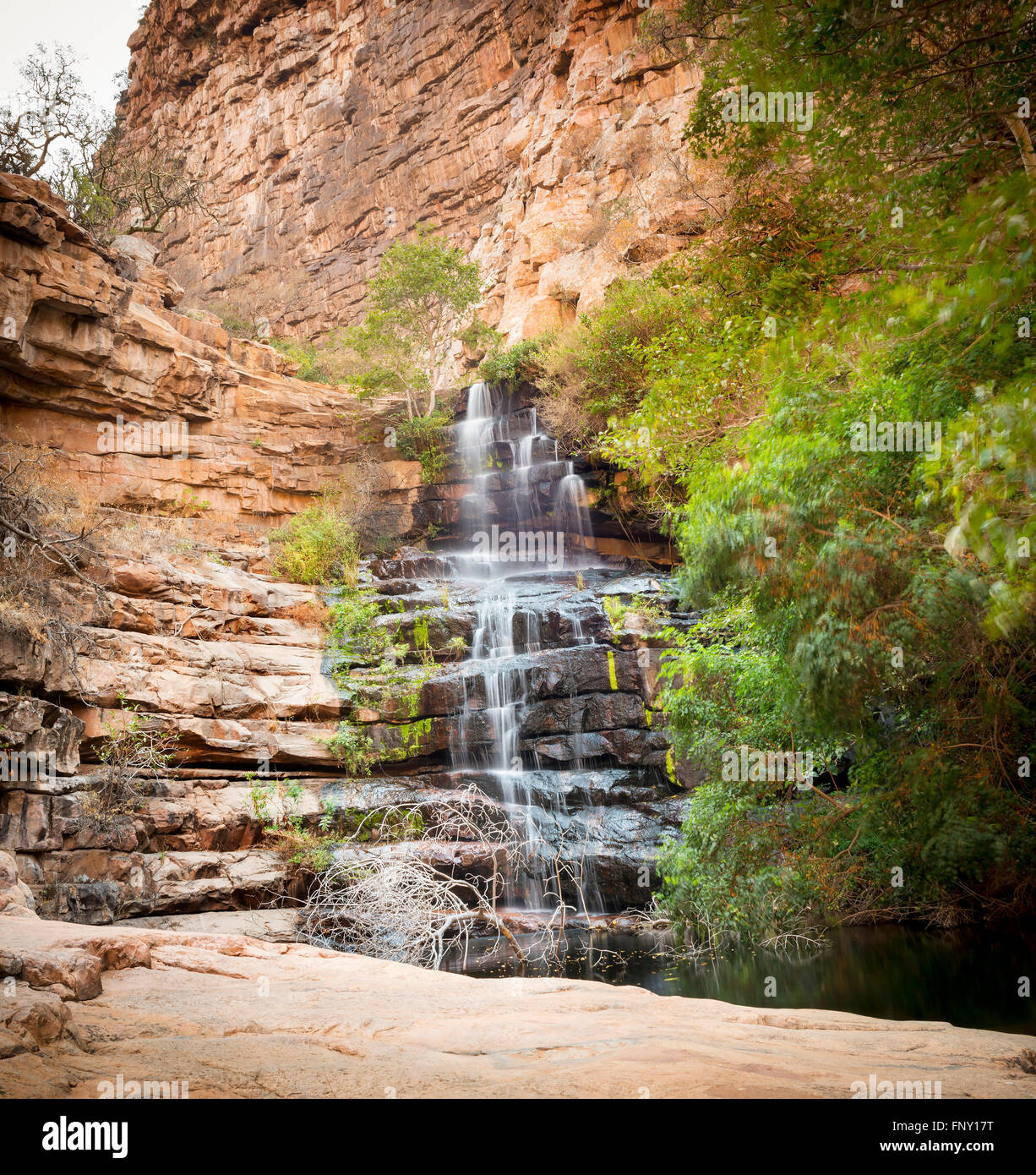Waterfall in Moremi Gorge, Botswana, Africa flowing down into the gorge ...