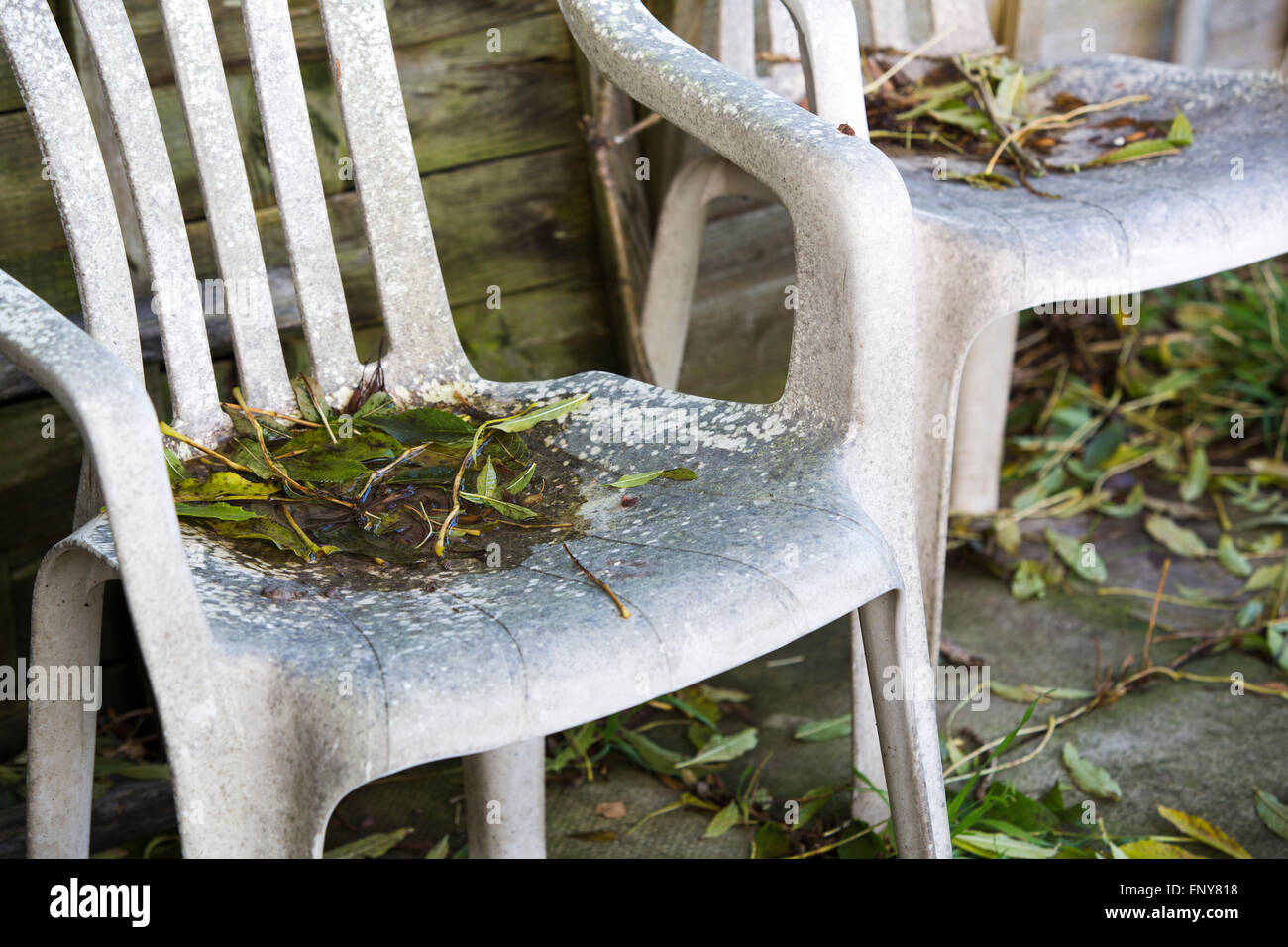 Wooden garden chair fallen hi-res stock photography and images - Alamy