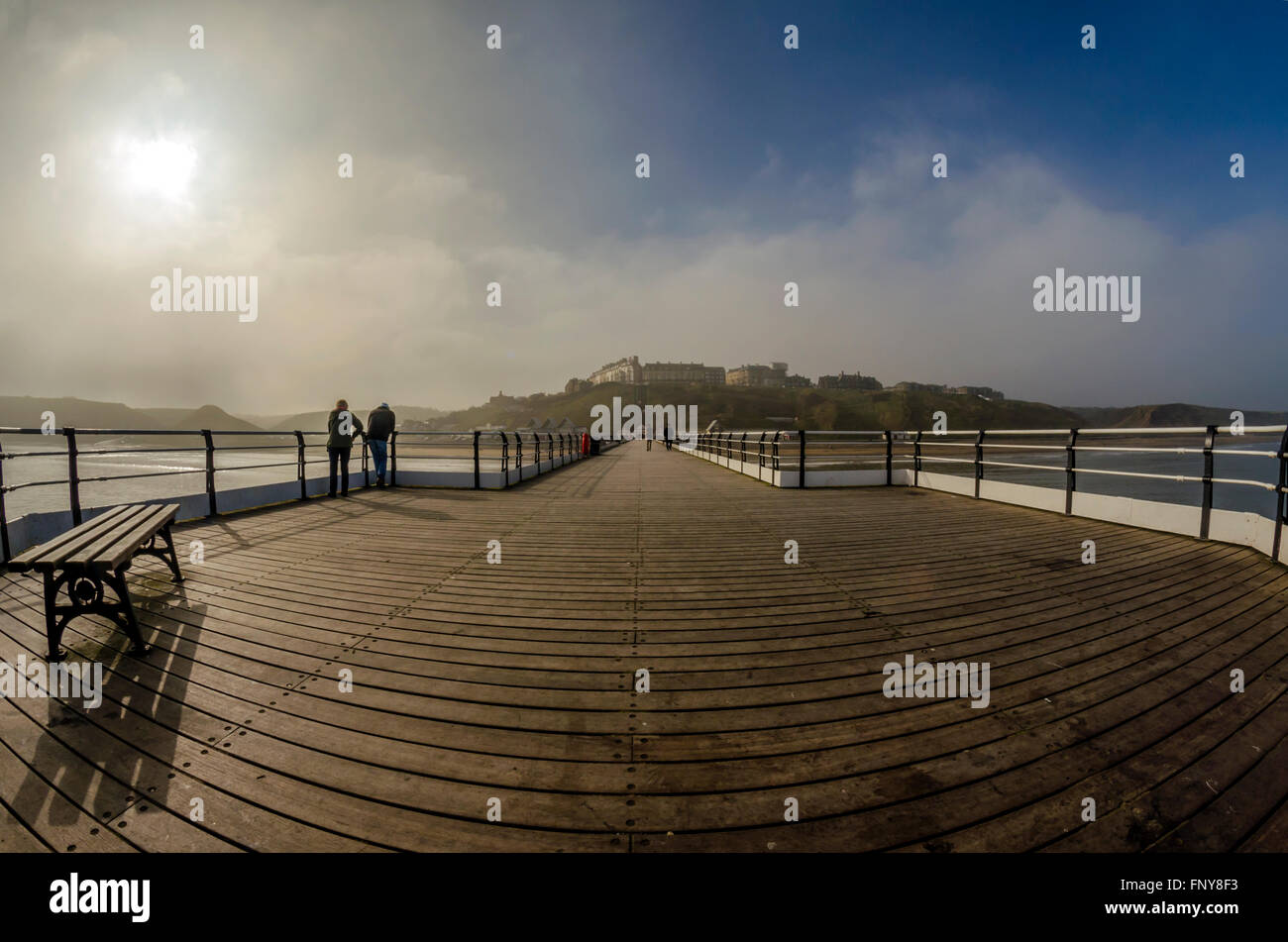 Fisheye view of the sun shining through the fog from the end of ...