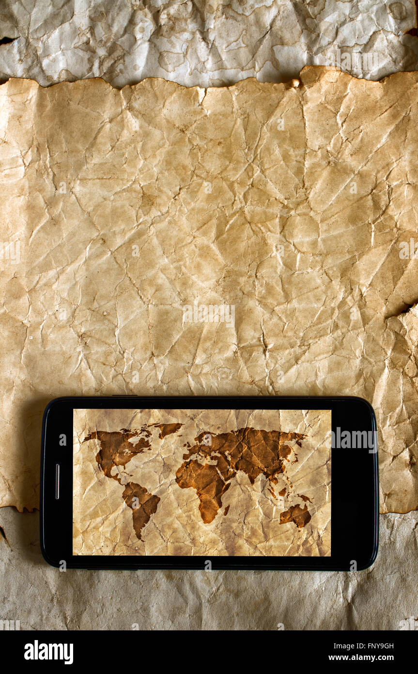 Old map and smartphone. Travel concept and background Stock Photo - Alamy