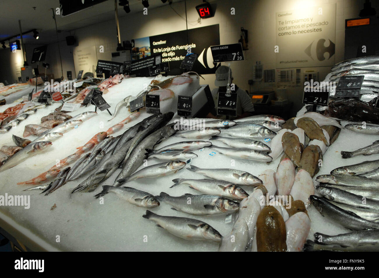 Fish section at a Carrefour Supermarket in Malaga Spain Stock Photo - Alamy
