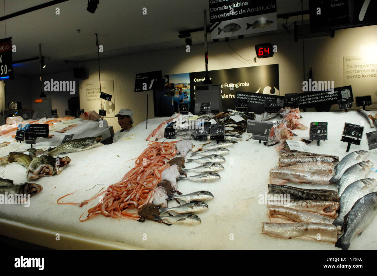 Fish section at a Carrefour Supermarket in Malaga Spain Stock Photo - Alamy