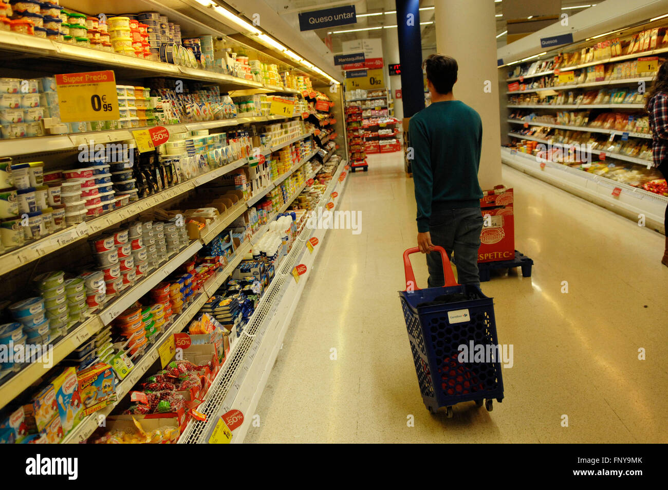 Carrefour Supermarket Shopper in Malaga Spain Stock Photo - Alamy
