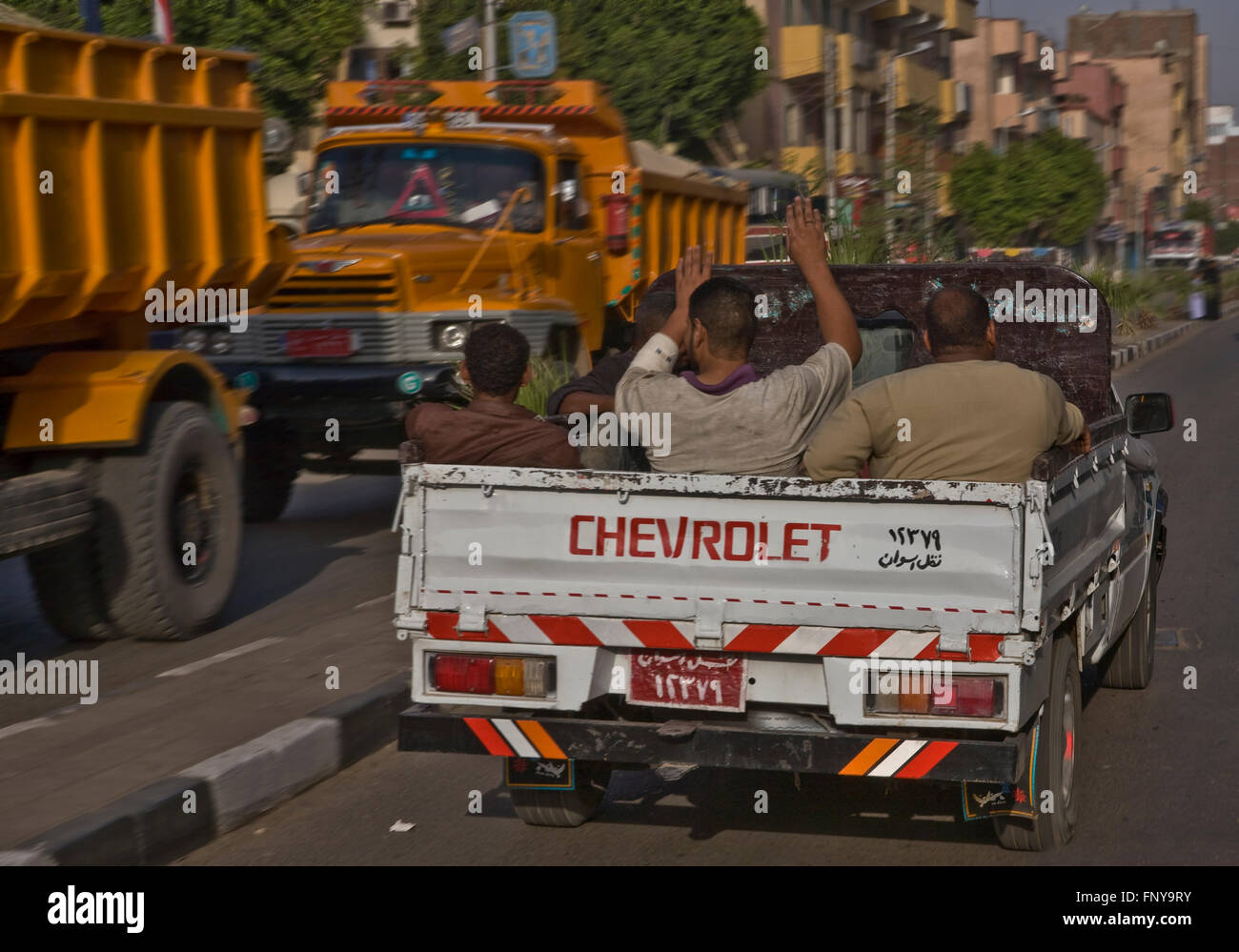 EDFU, EGYPT - JULY 18: Unidentified men in a pick up truck by Edfu ...