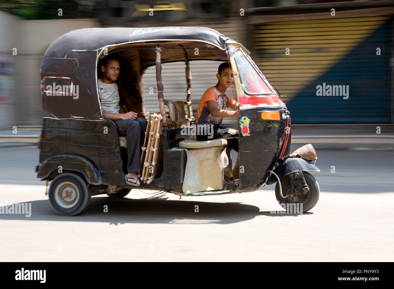 Rickshaw at city centre with heavy traffic hi-res stock photography and ...