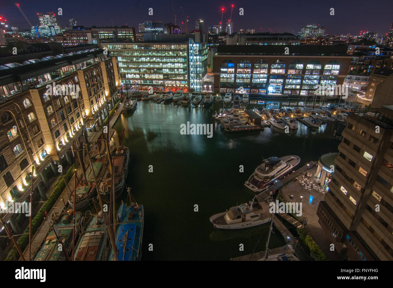 St Katherine's Dock Marina with boats and yachts at night, London UK ...
