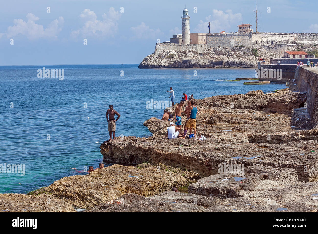 HAVANA, CUBA - APRIL 1, 2012: Teenagers swimming in Caribbean sea near ...