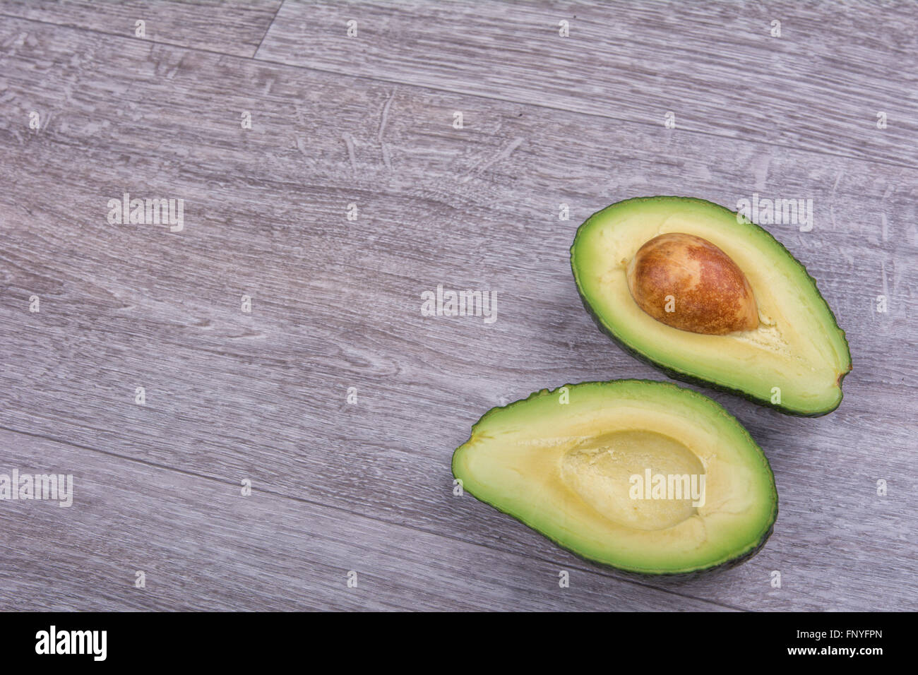 Half cut ripe avocado hi-res stock photography and images - Alamy