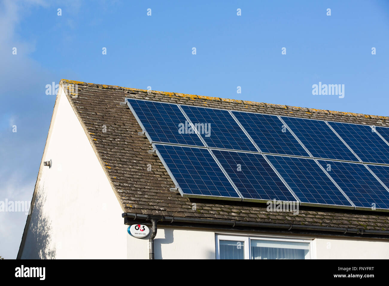 Solar panels on the roof tops of housing in the UK Stock Photo - Alamy