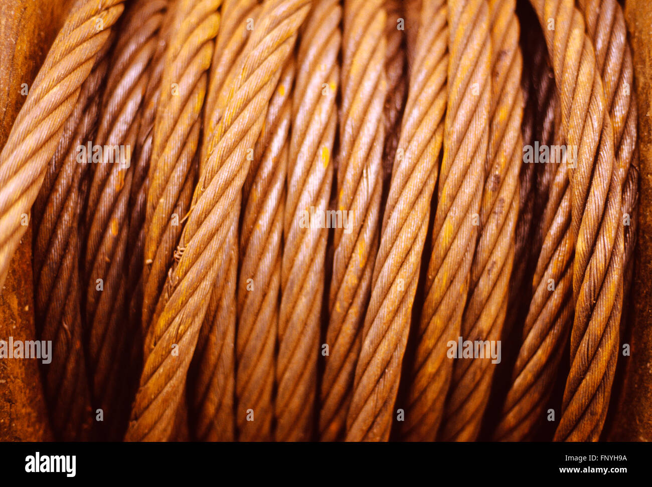 Rusty coiled steel metal winch cable Stock Photo - Alamy