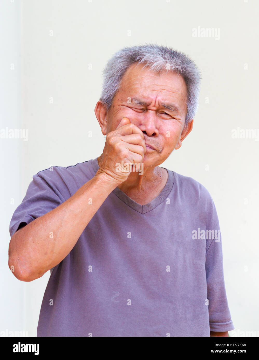 old man use hand covered mouth pretending toothache Stock Photo - Alamy