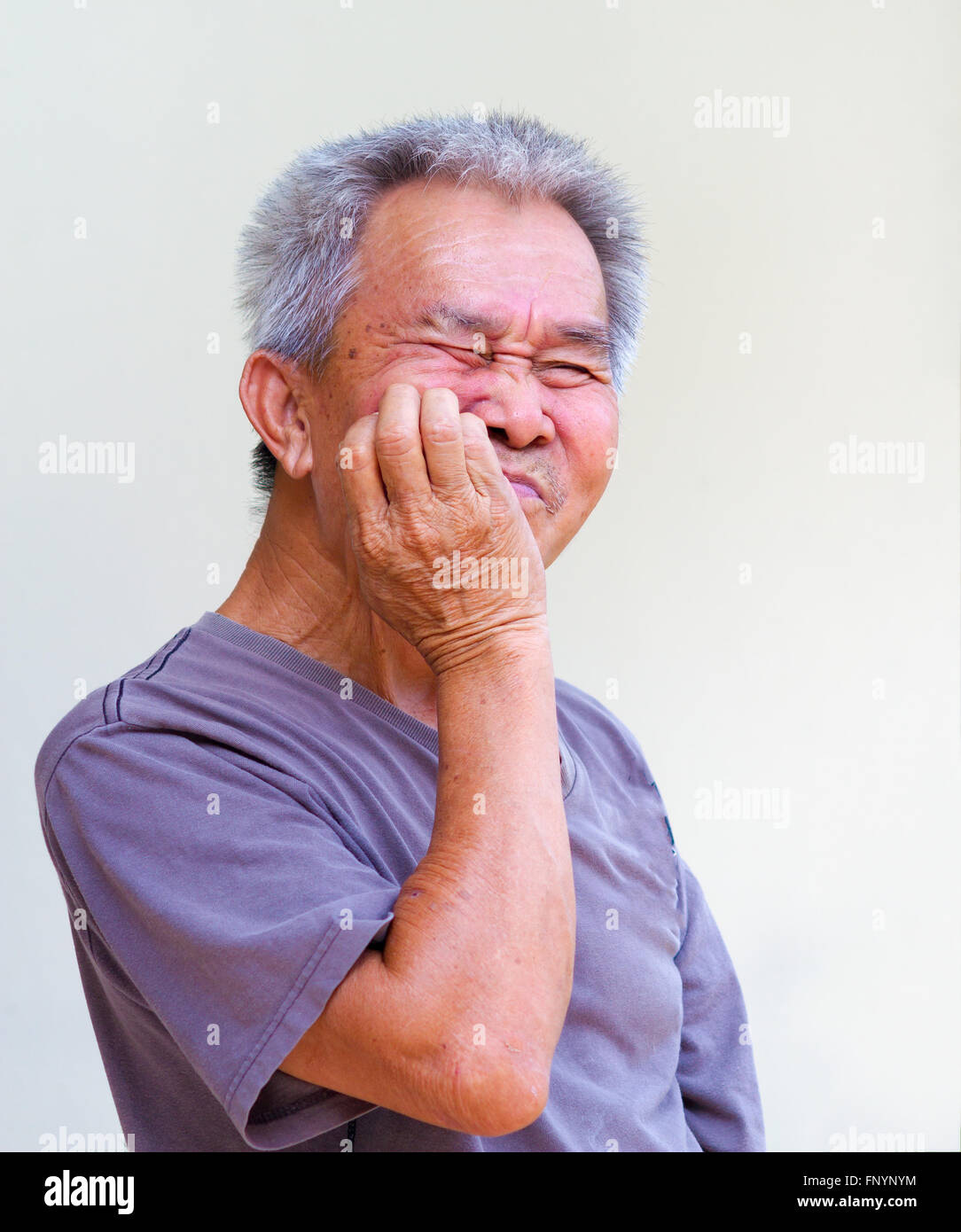 Old man hand covered mouth hi-res stock photography and images - Alamy