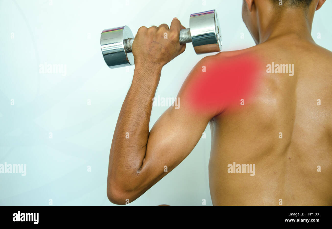 fit man with shoulder pain and injury from fitness Stock Photo - Alamy