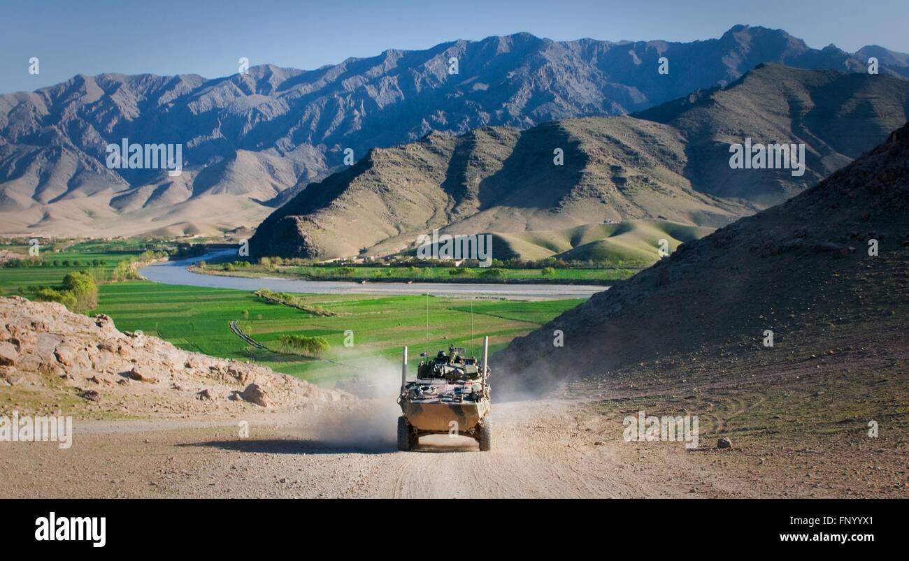 An Australian Army Service Light Armored Vehicle drives through a ... An Australian Army Service Light Armored Vehicle drives through a ...