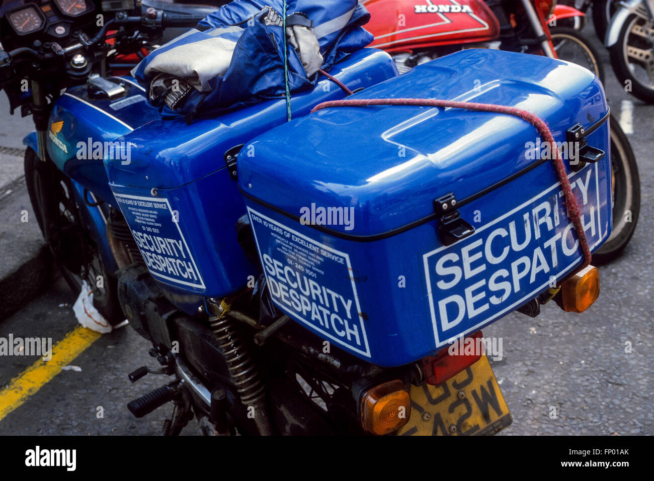 Motorcycle couriers double top box fitted to the bike in central London ...
