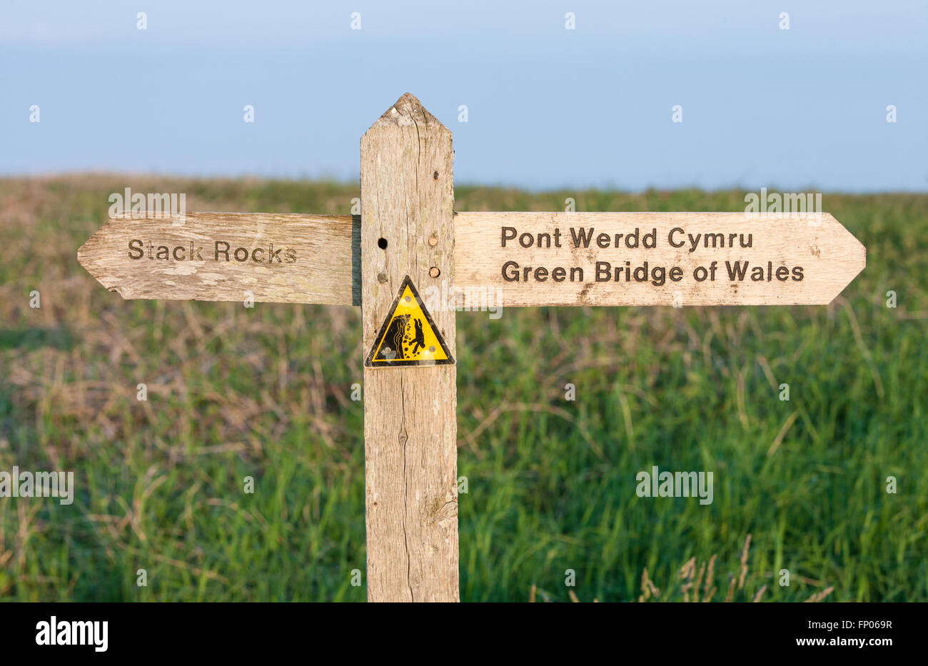 Signpost for Stack Rocks and Green Bridge of Wales, and danger of cliff ...
