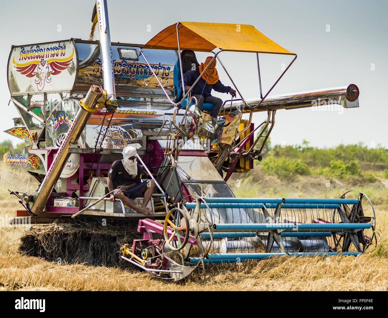 Mechanical rice harvester hi-res stock photography and images - Alamy