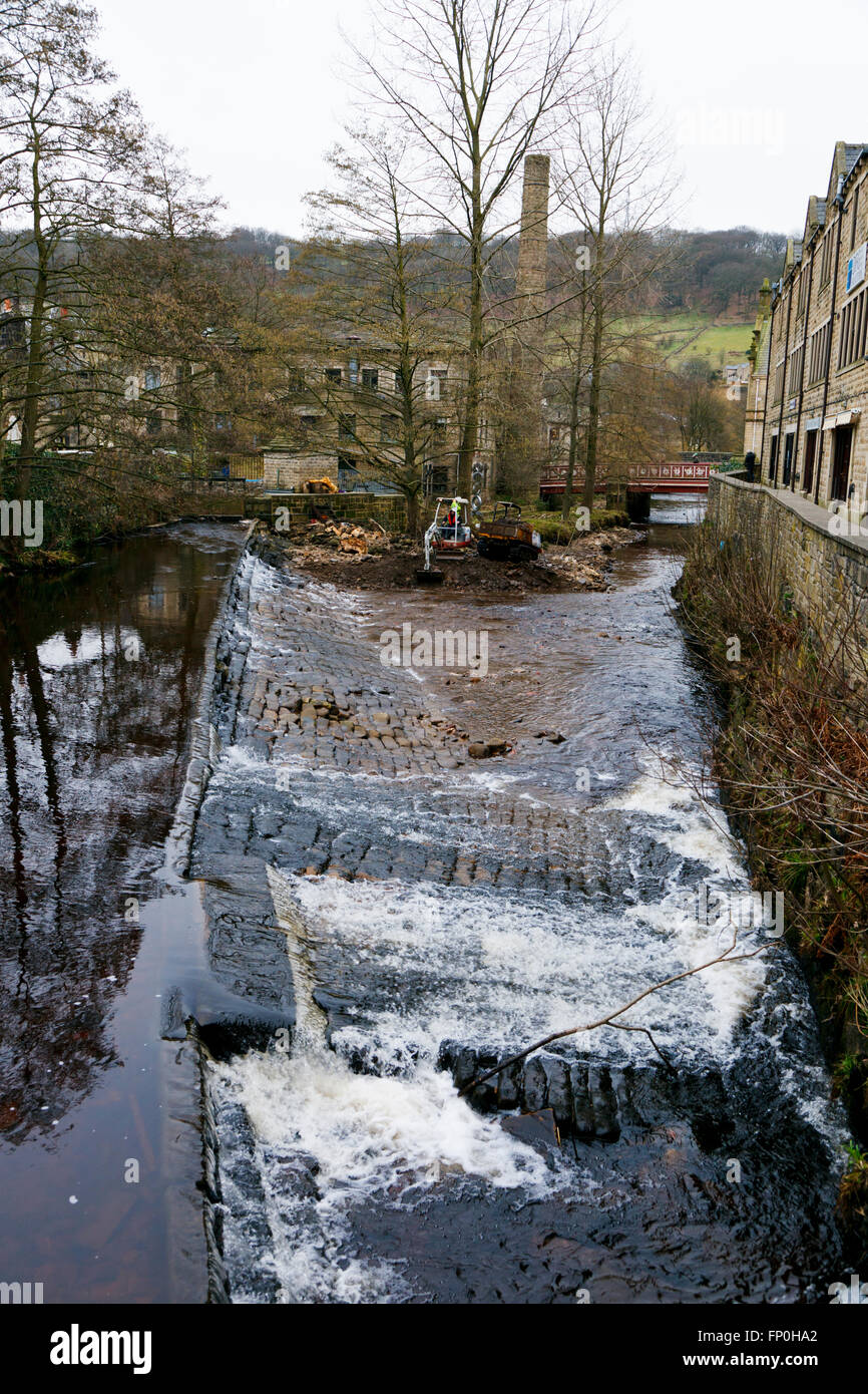 View along the Hebden Beck weir towards a small rubber track carrier ...