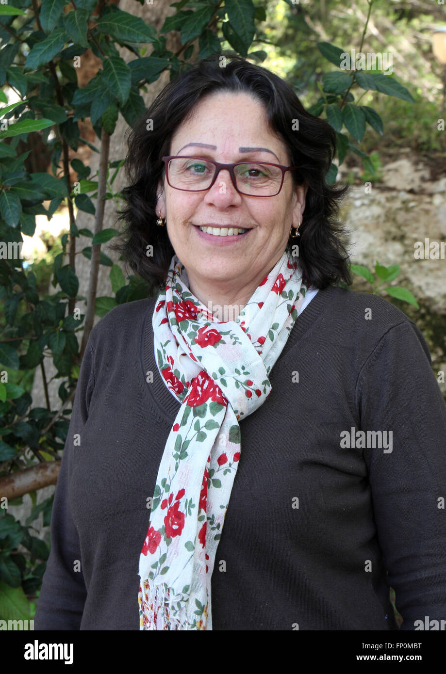 Rita Boulos, public relations representative of the village, smiling in ...