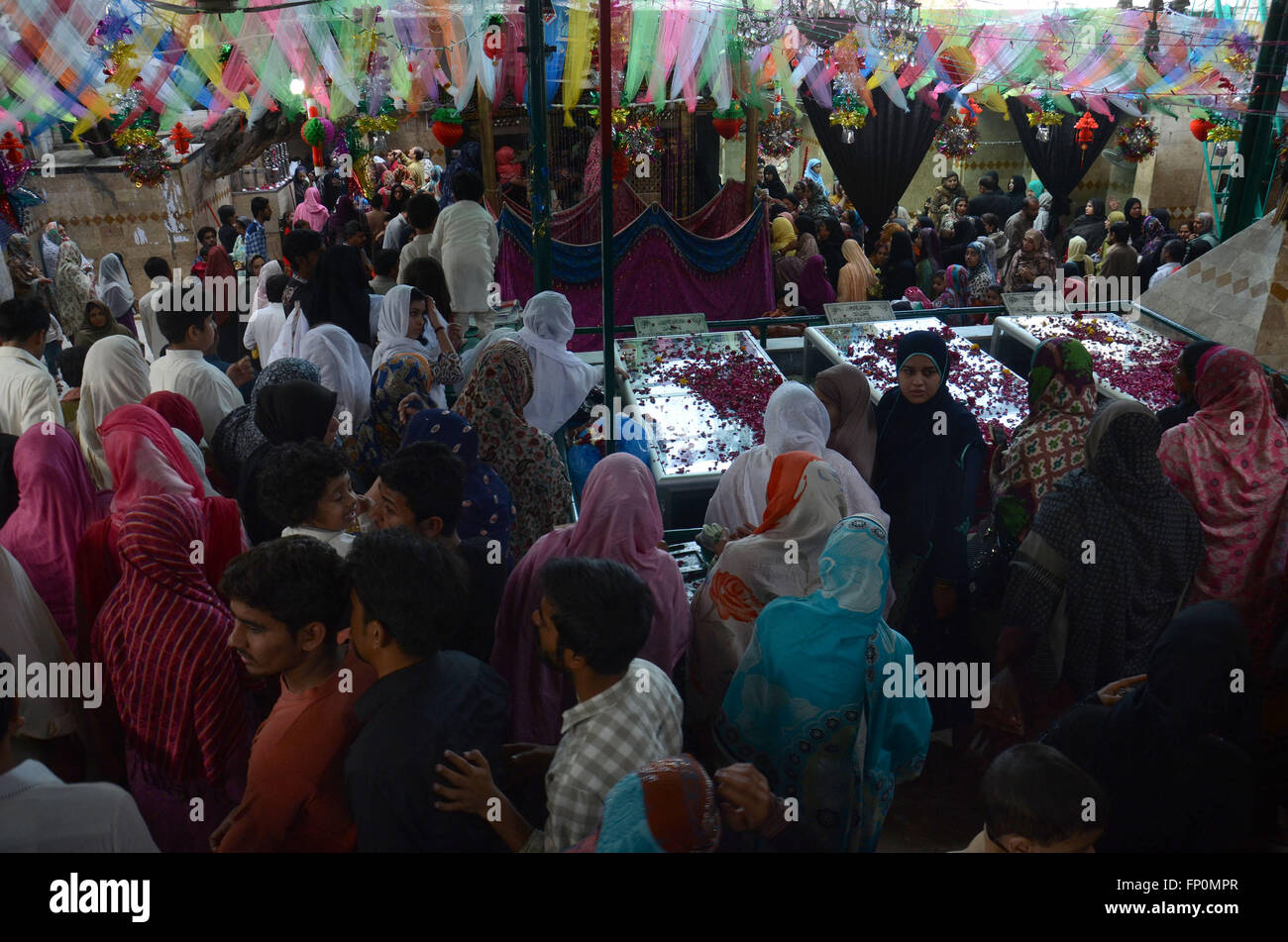 Lahore, Pakistan. 16th Mar, 2016. Pakistani women devotees bringing ...