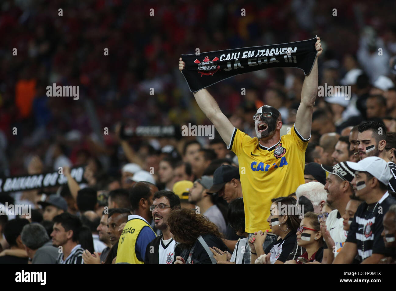 Sao Paulo, Brazil. 16th Mar, 2016. A fan of Brazil's Corinthians cheers ...