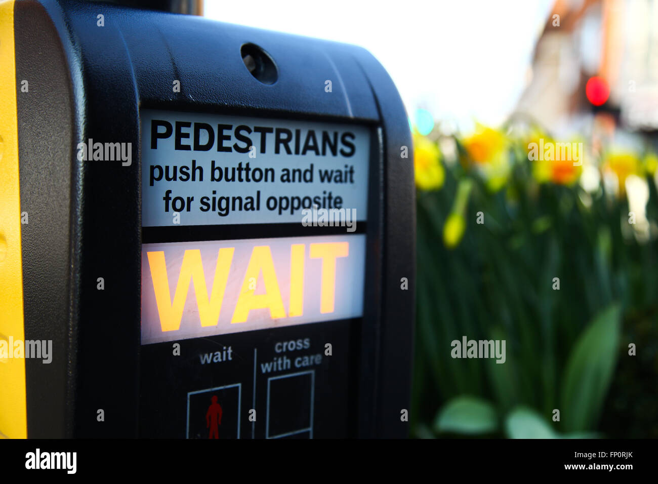 Pedestrian crossing button in North London Stock Photo - Alamy