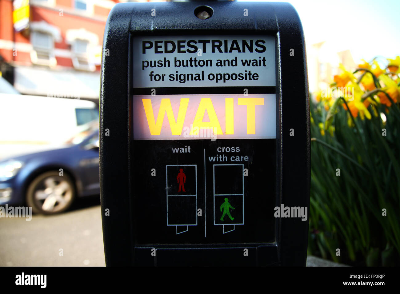 Pedestrian crossing button in North London Stock Photo - Alamy