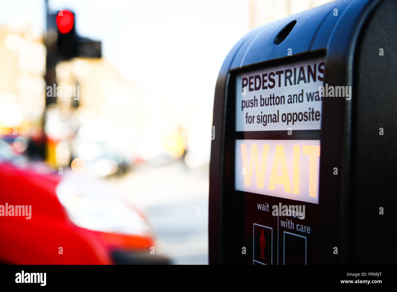 Pedestrian crossing button in North London Stock Photo - Alamy