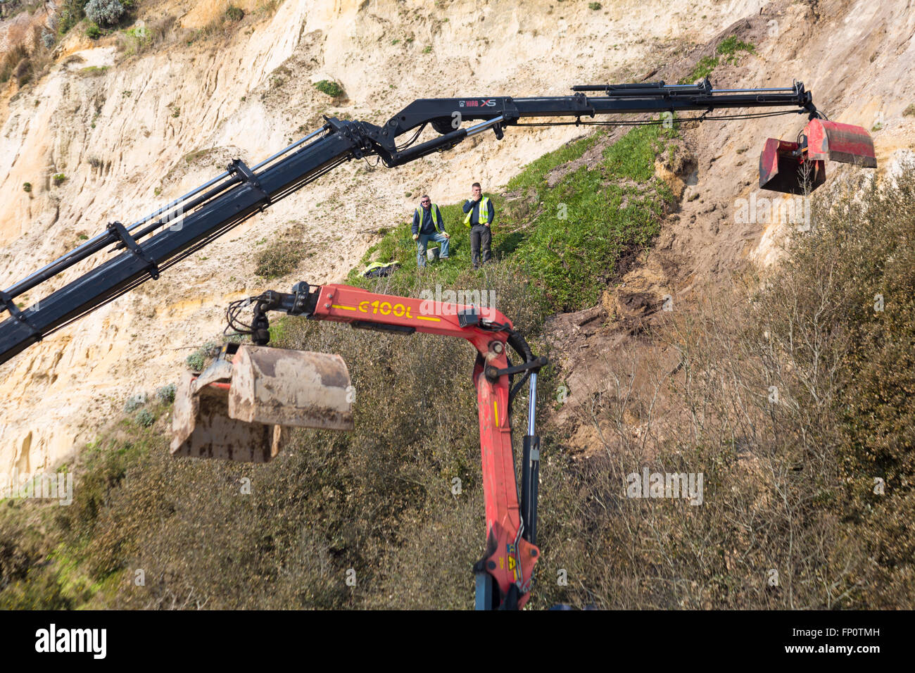 Alum Chine, Dorset, UK 17 March 2016. Clearing away landslide near Alum ...