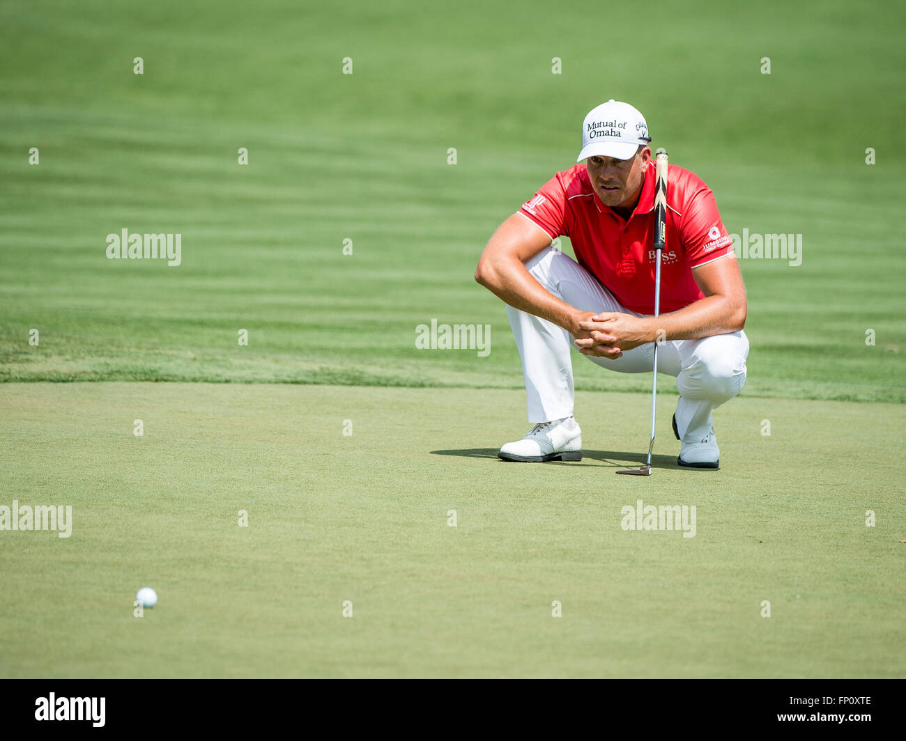 Orlando, FL, USA. 17th Mar, 2016. Henrik Stenson of Sweden lines up his ...