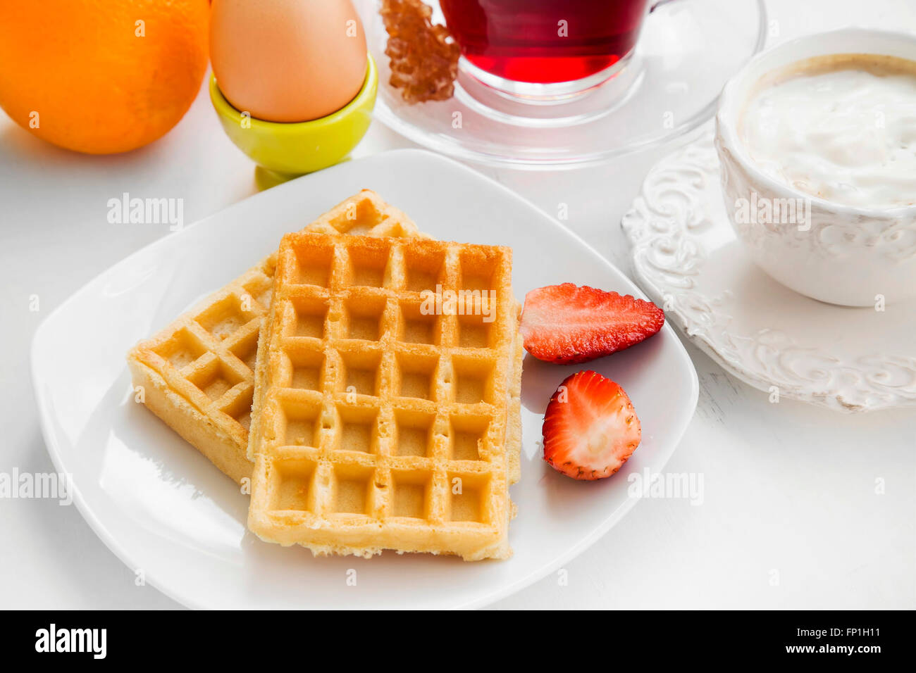 Tea pancakes waffles fresh strawberries hi-res stock photography and ...