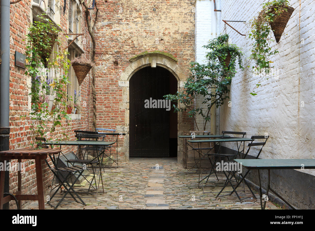 The medieval alley named "Vlaeykensgang" (1591) in Antwerp, Belgium ...