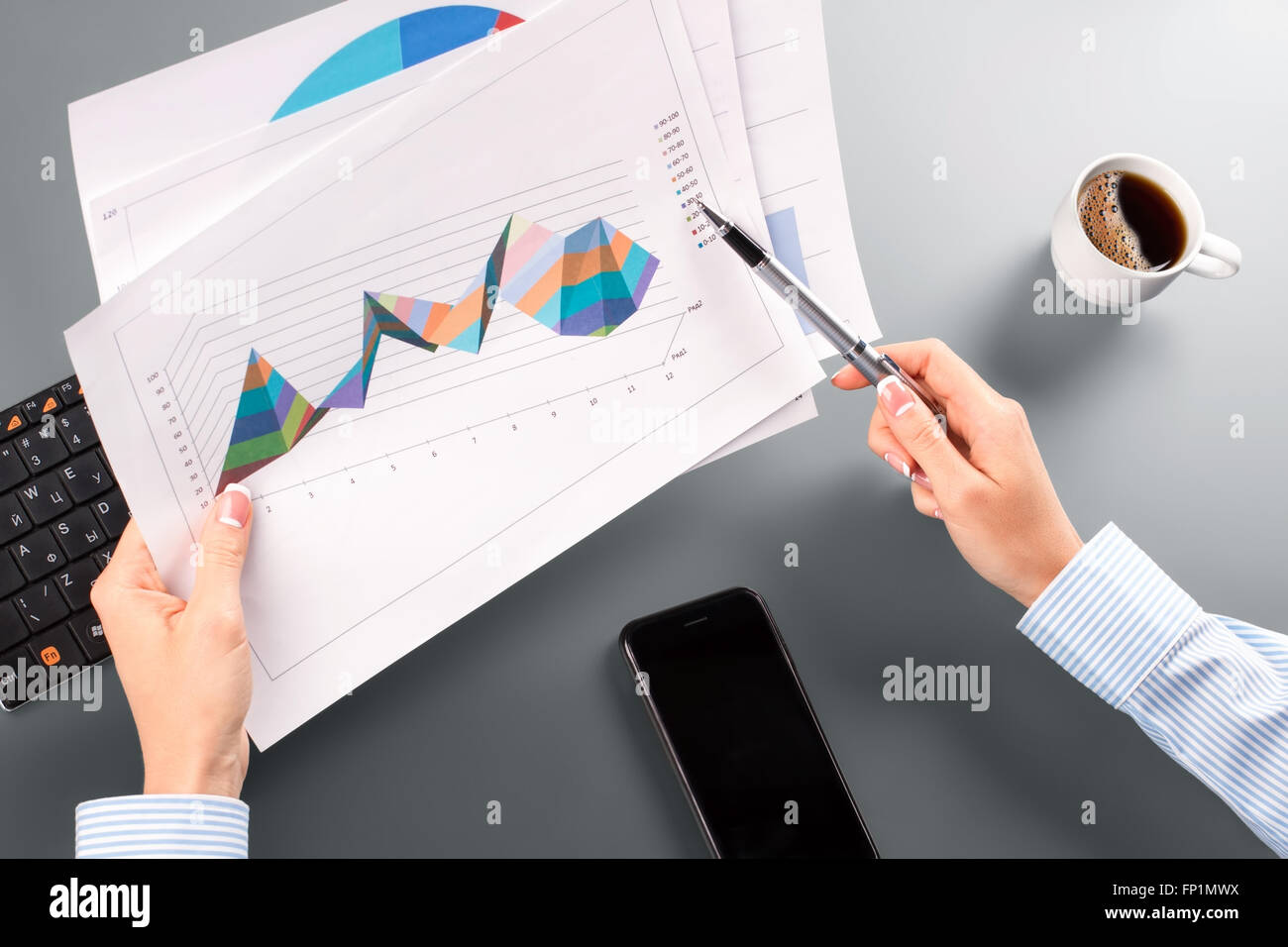 Lady with pen and charts. Woman holding charts and pen. Must study ...