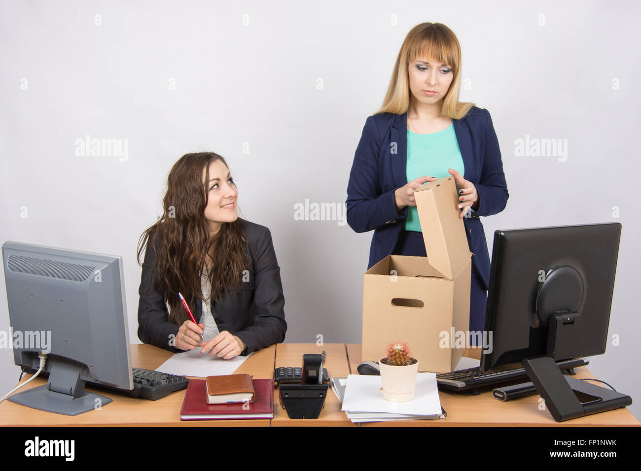 Office staff member hi-res stock photography and images - Alamy