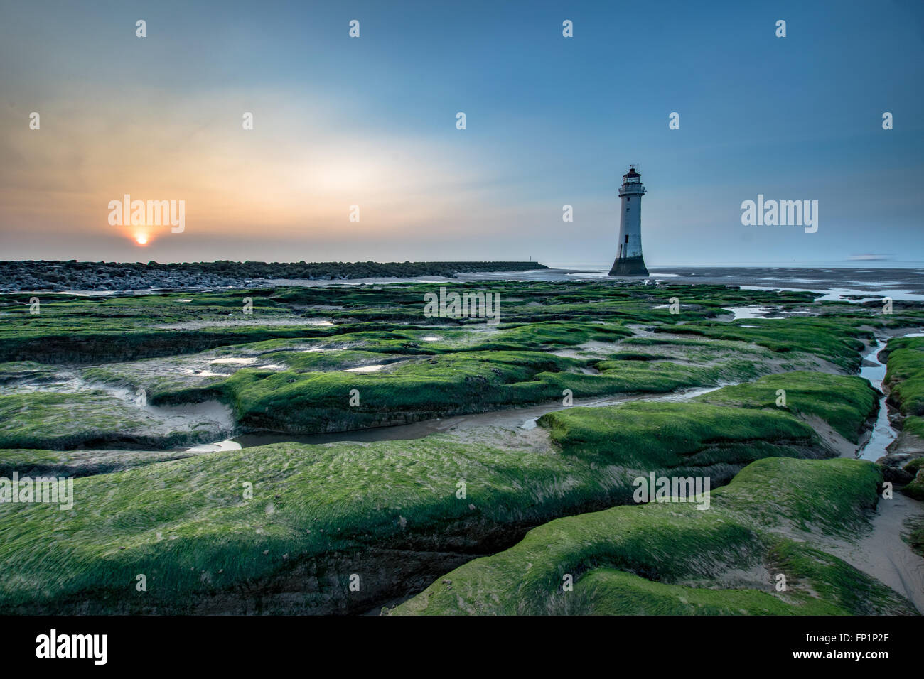 New Brighton Lighthouse sunset beach rocks Wirral coast Stock Photo - Alamy