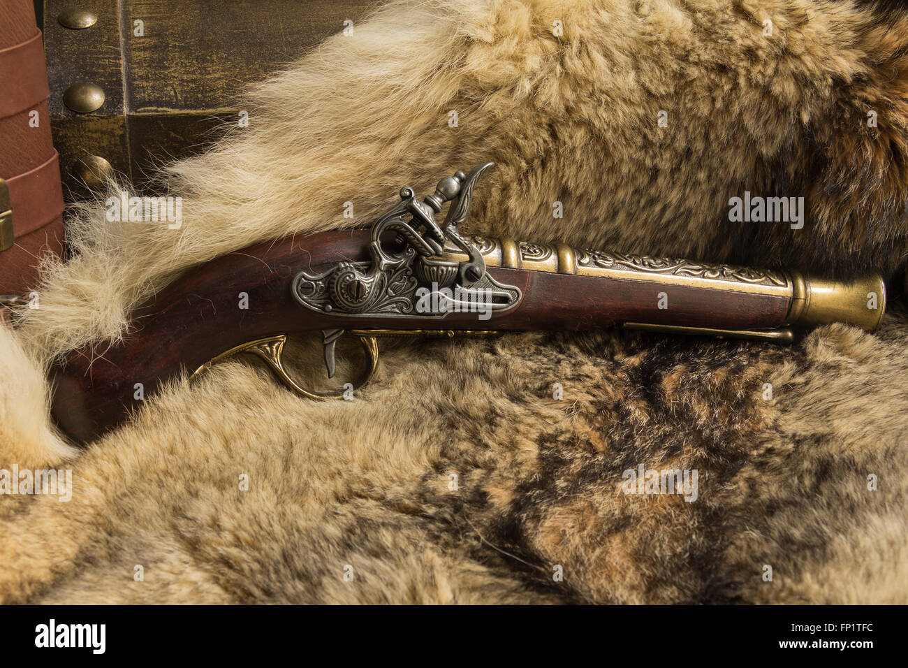 souvenir gun and fur Stock Photo - Alamy