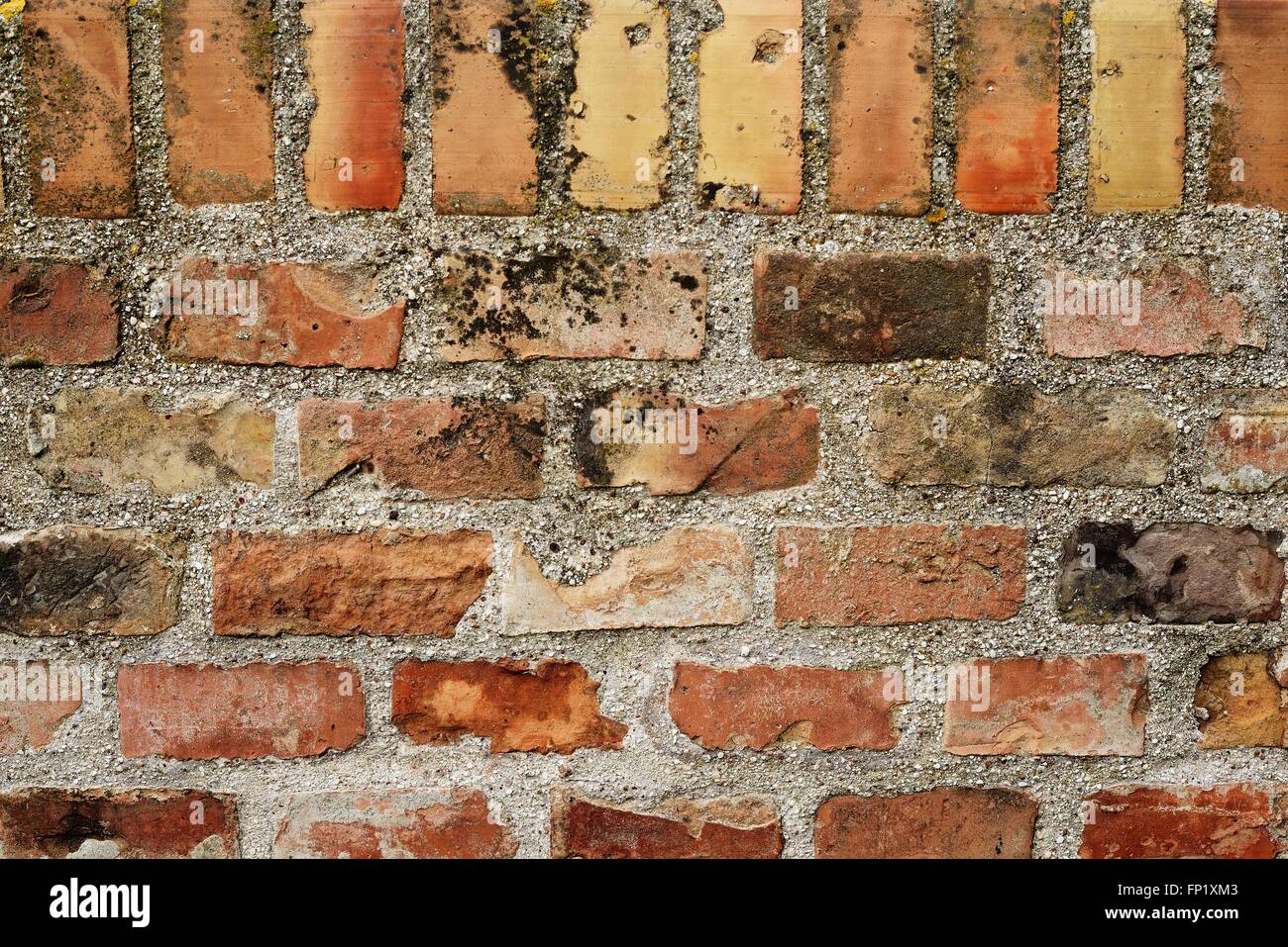 Ocher bricks wall Stock Photo - Alamy