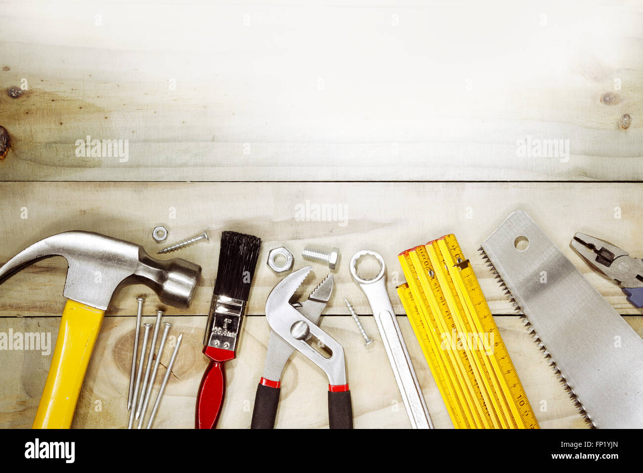 Assorted work tools on wood Stock Photo - Alamy