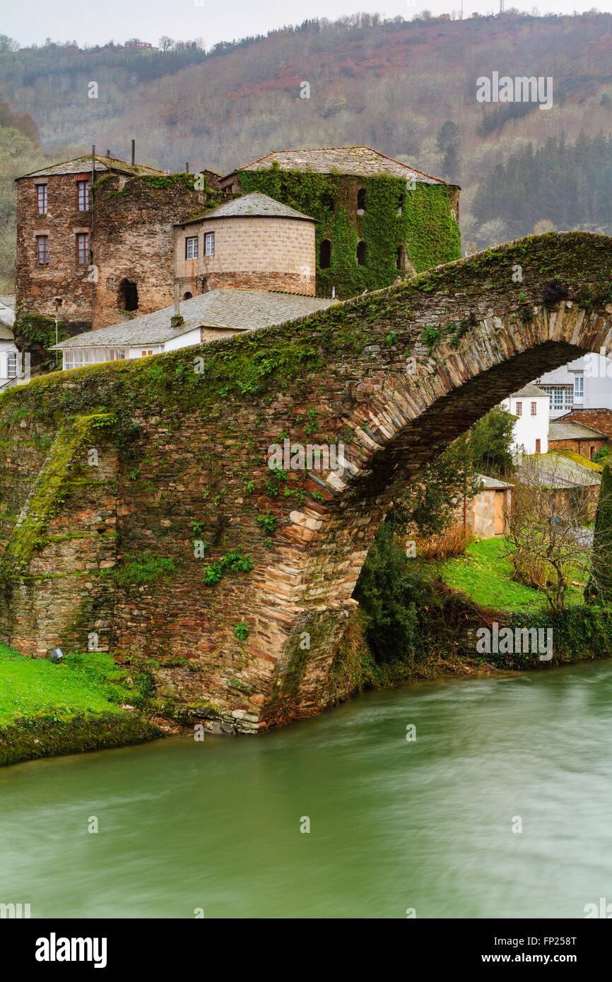 Medieval bridge and castle of Navia de Suarna (Ancares). Ancares is a ...