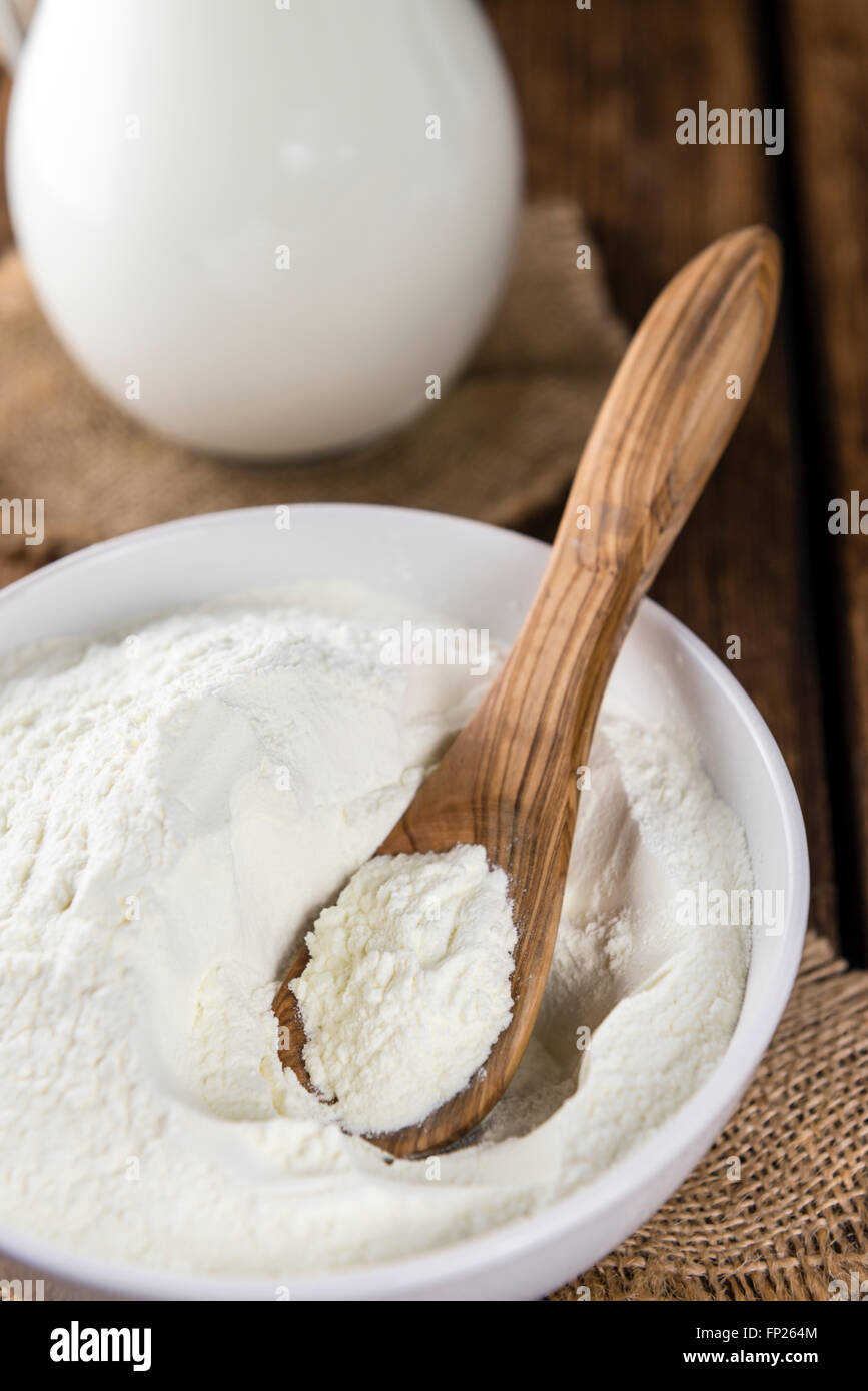 Portion of Milk Powder (close-up shot) on wooden background Stock Photo ...