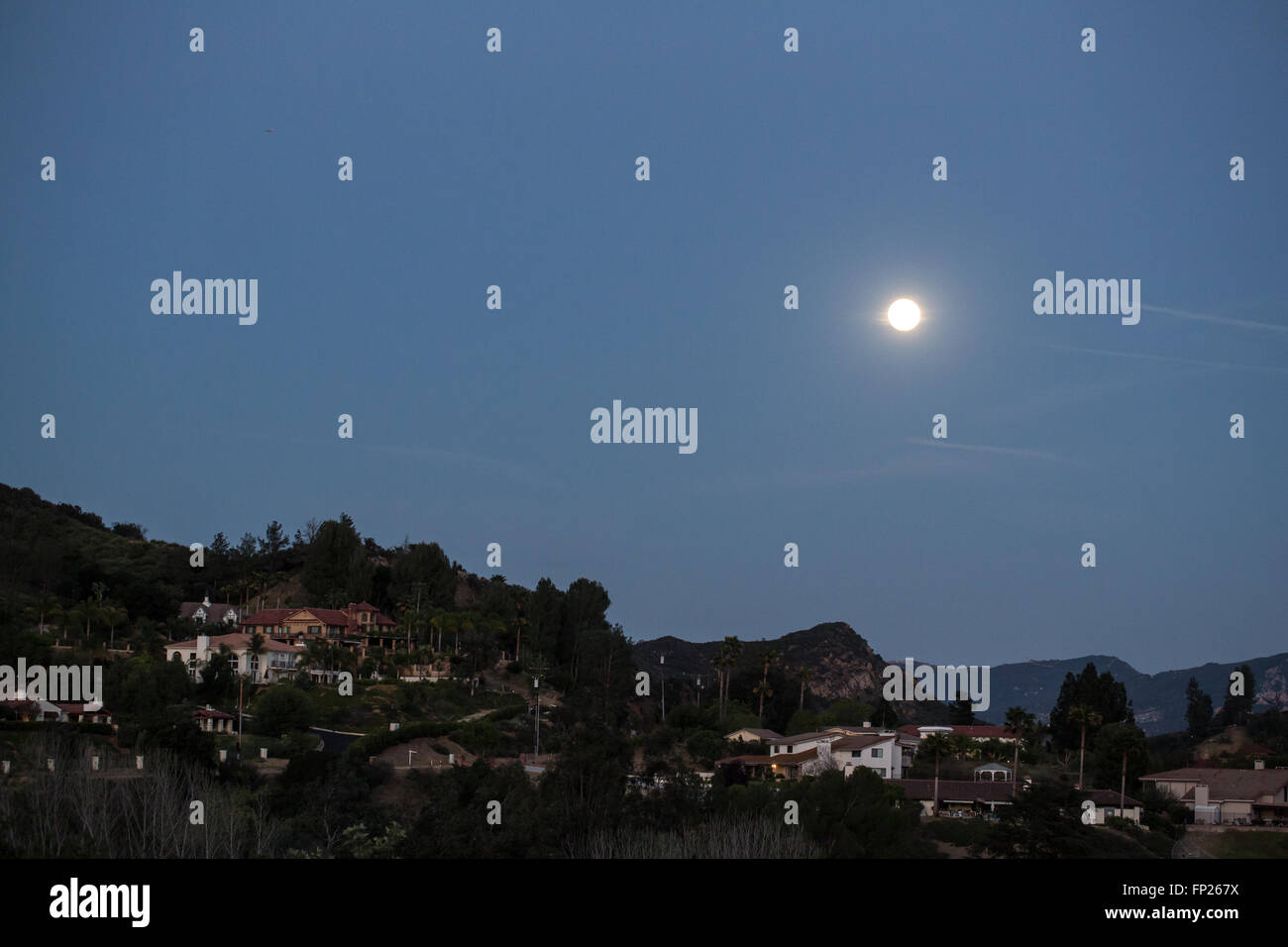 Full moon over a suburb in California Stock Photo - Alamy
