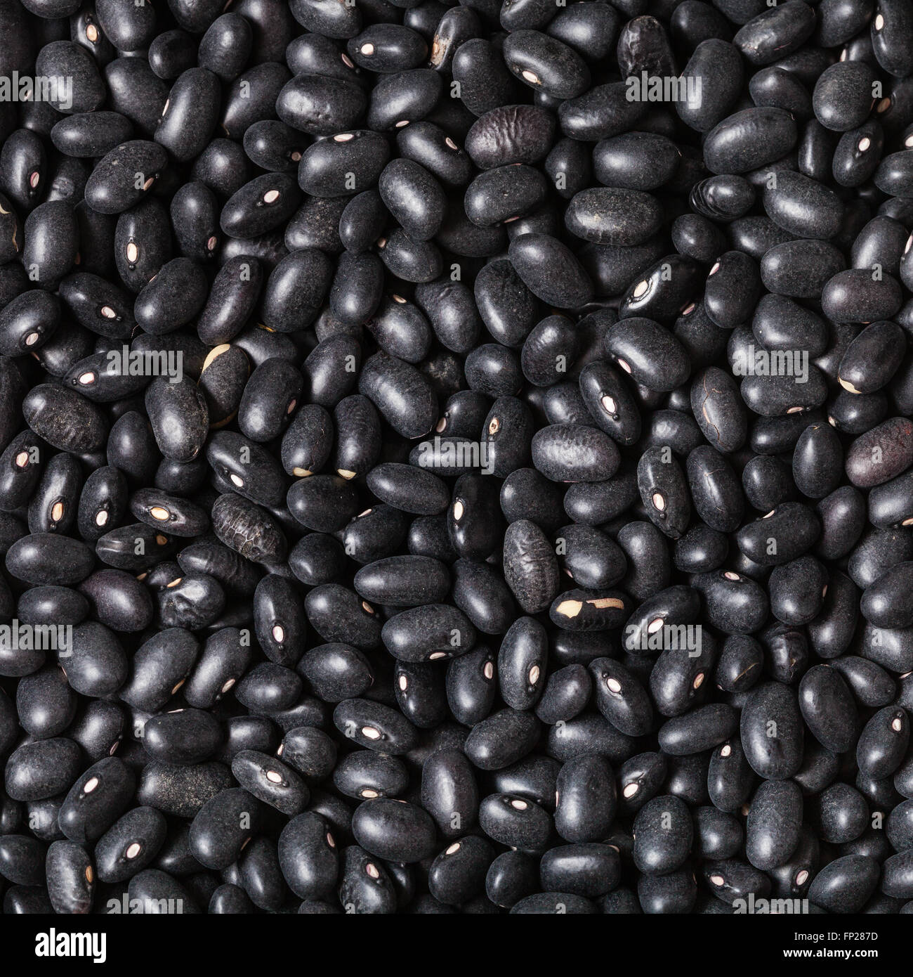 square food background - many raw Black beans close up Stock Photo - Alamy