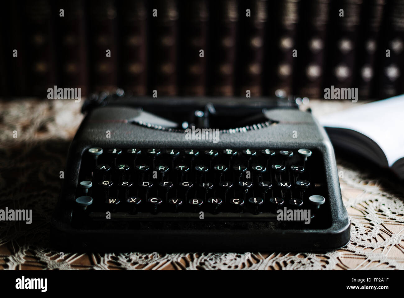 Vintage typewriter and old books Stock Photo - Alamy